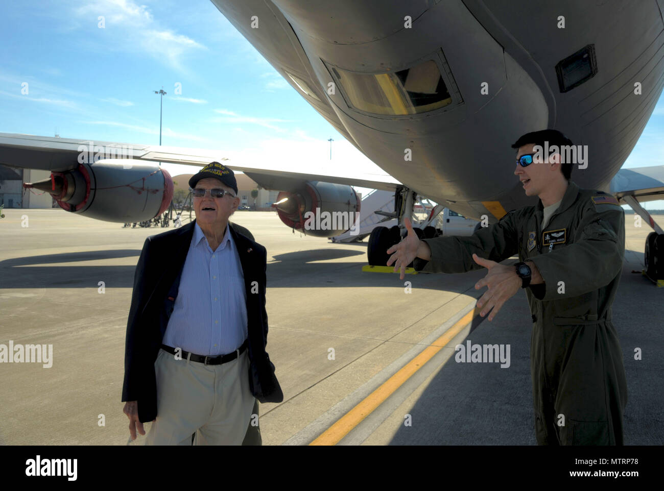 Capt. Daniel Hickox, right, chief of readiness assigned to the 91st Air ...