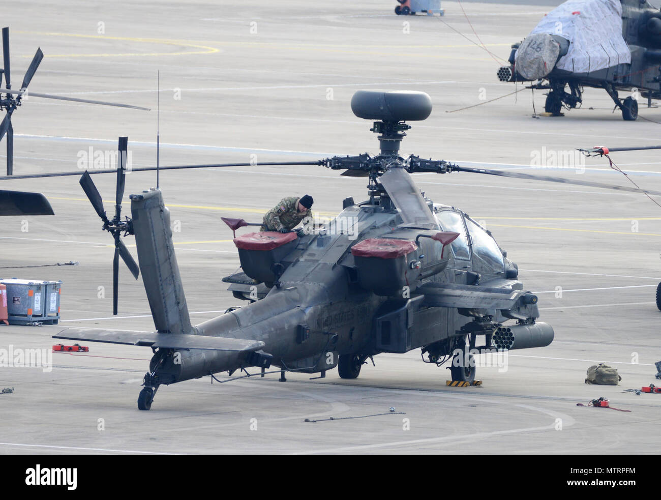 Apache helicopter crew members from 1st Battalion, 3rd Aviation ...