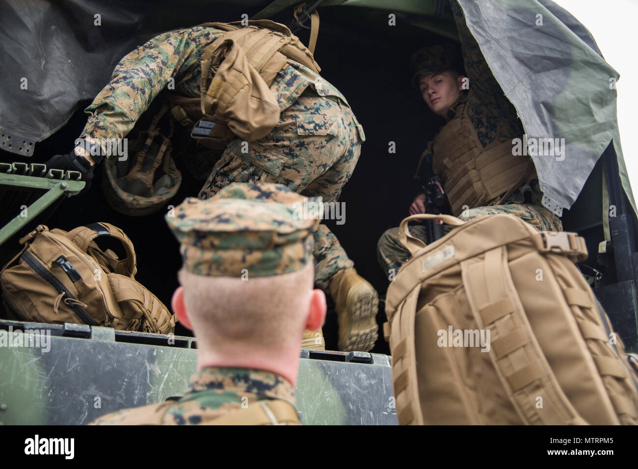 Marines load up for transportation during a Strategic Mobility Exercise ...