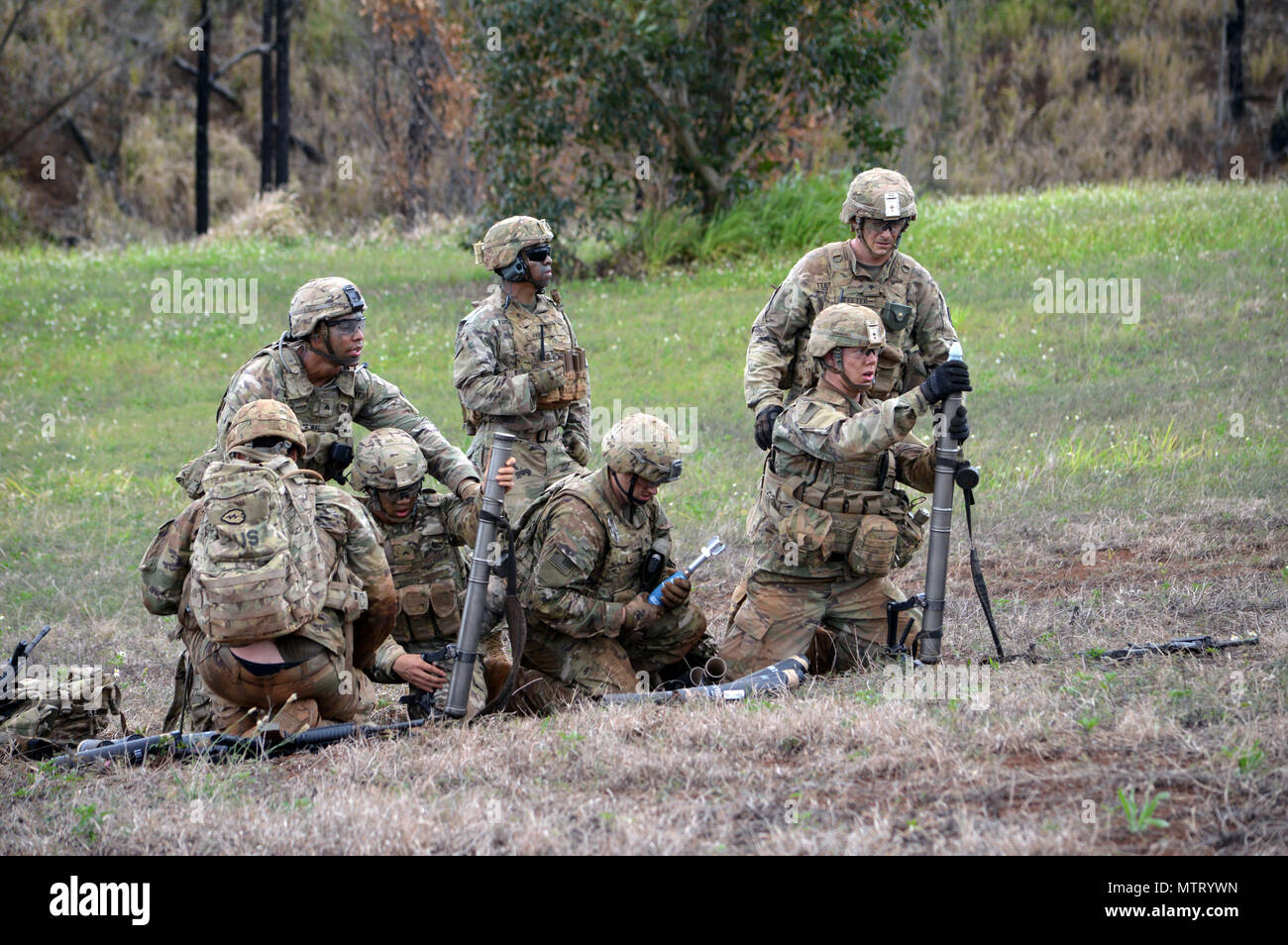 A mortar team assigned to the 2nd Battalion, 27th Infantry Regiment ...