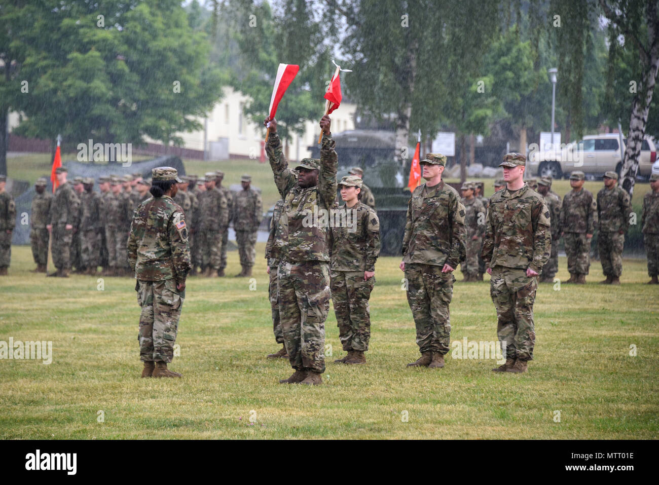 U.S. Soldiers with 44th Expeditionary Signal Battalion, 2nd Theater Signal Brigade, stand in ...
