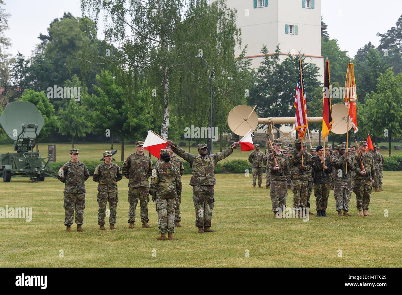 U.S. Soldiers with 44th Expeditionary Signal Battalion, 2nd Theater Signal Brigade, stand in ...