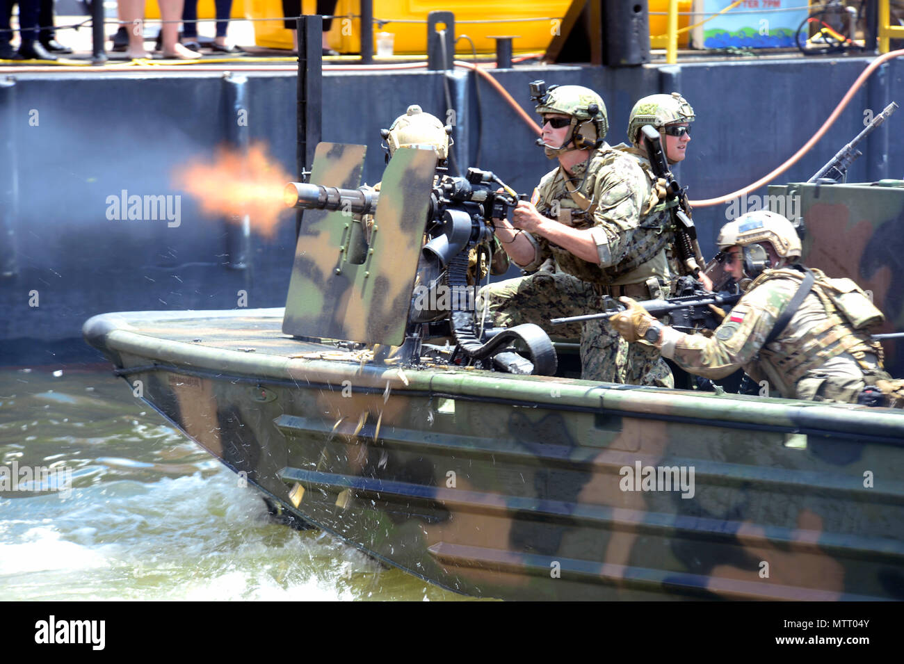 Multinational special operations forces assault a mock village from ...