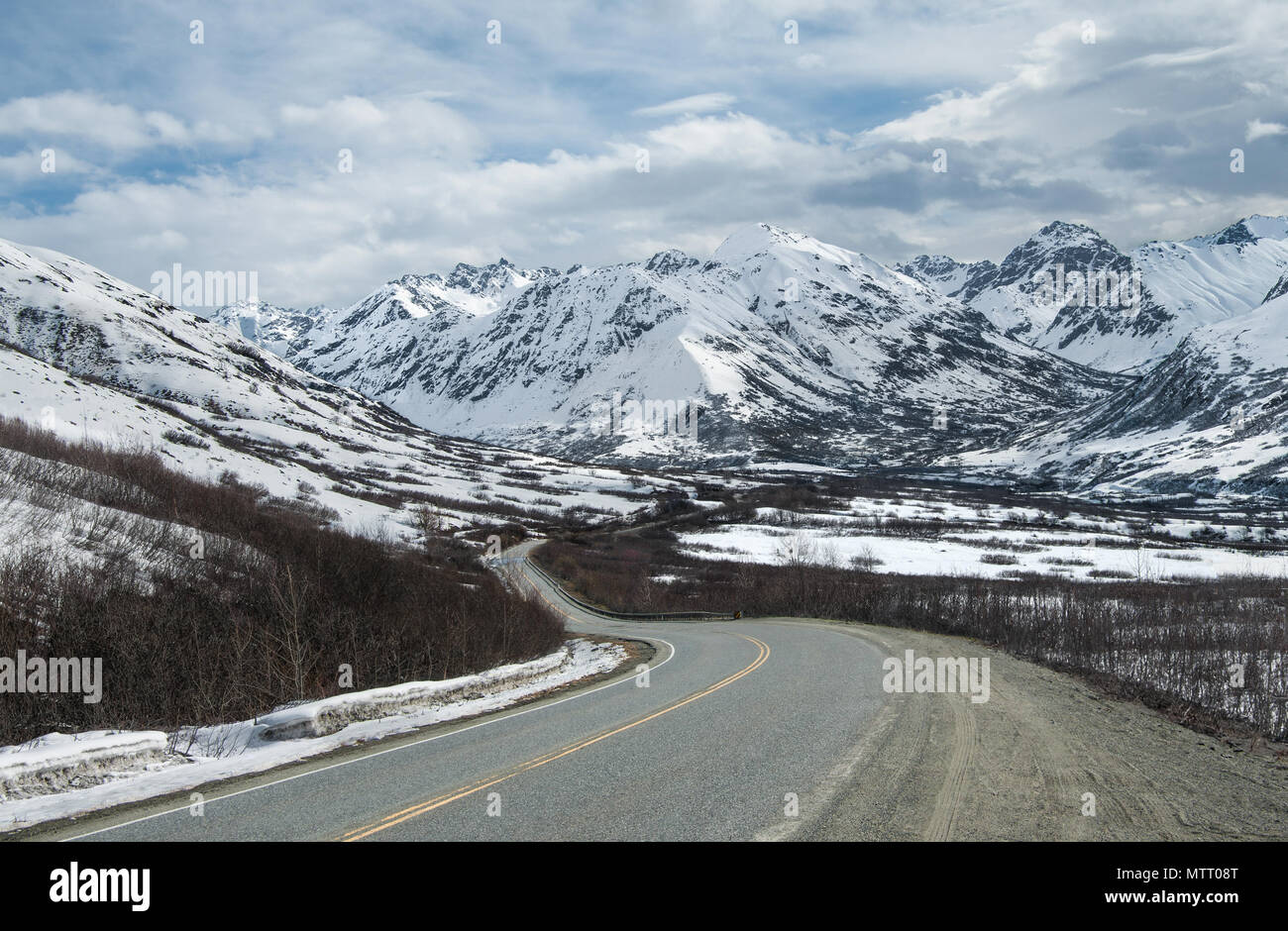 Alaska Mountain Byway: A narrow road descends from Hatcher Pass in the ...