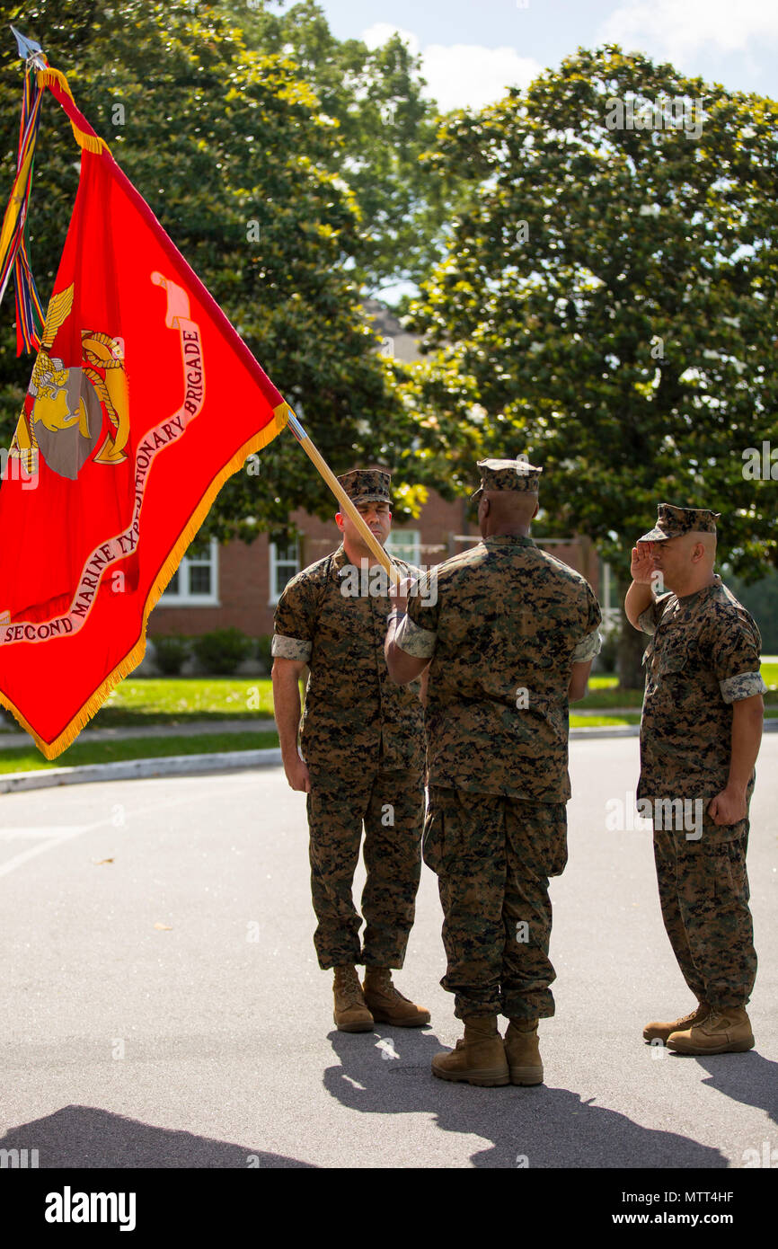 U.S Marine Corps Brig. Gen. Michael E. Langley passes the colors to Col ...