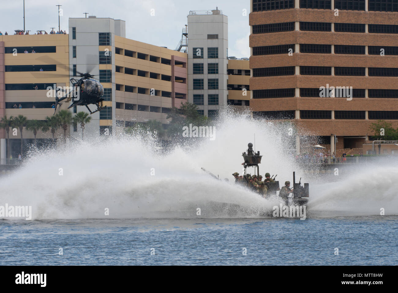 Multinational Special Operations Forces aboard an MH-6 Little Bird ...