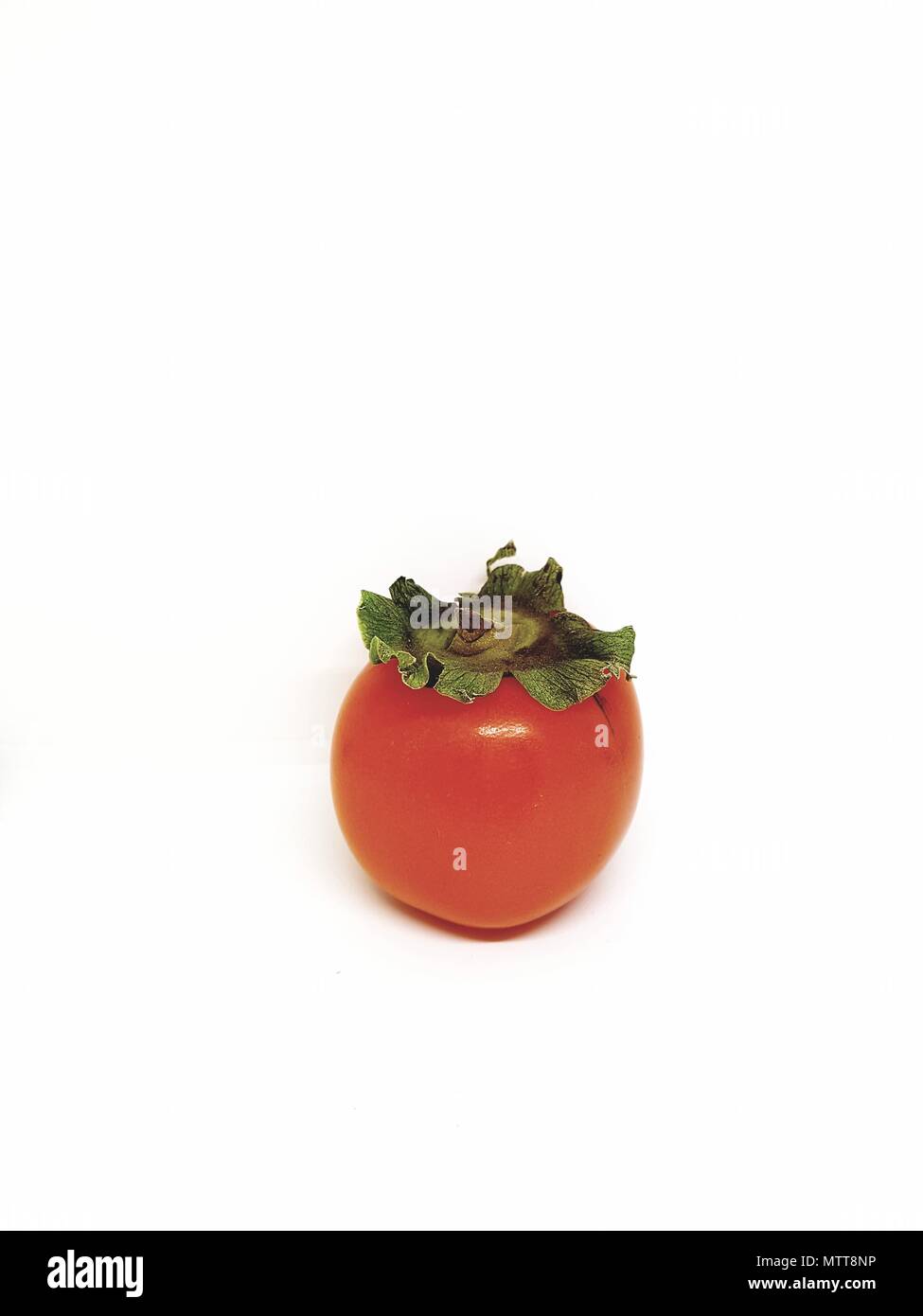 one persimmon isolated on white background Stock Photo - Alamy