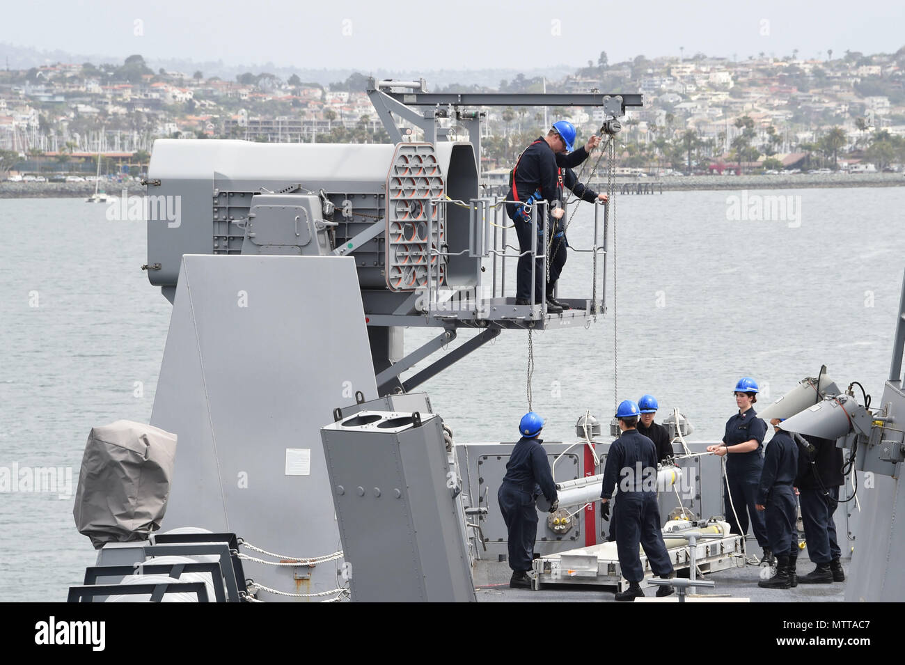 SAN DIEGO (May 21, 2018) Fire Controlman 2nd Class Travis Stevens (left ...
