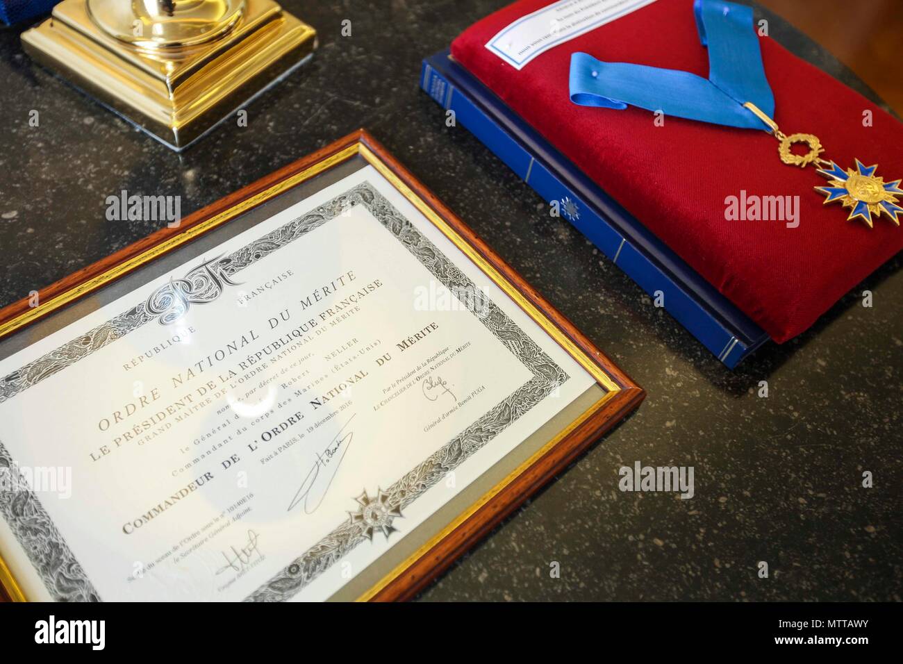 The French National Order of Merit Award is displayed before a ceremony ...