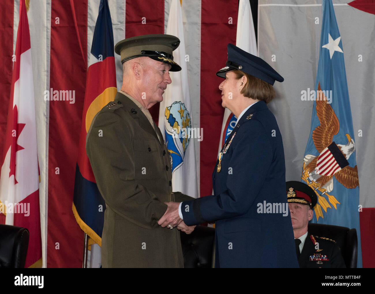 The Chairman of the Joint Chiefs of Staff, Marine Corps Gen. Joseph F. Dunford Jr. presents U.S ...