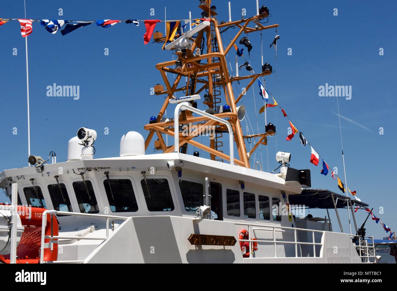 The crew of the Coast Guard Cutter Richard Snyder, a 154-foot Sentinel ...