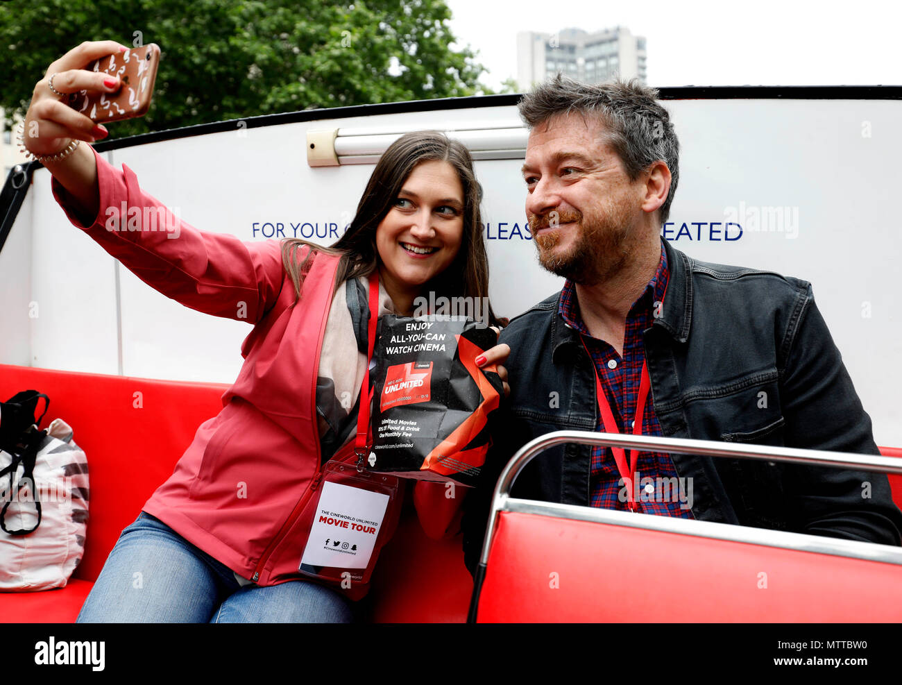 Movie fans take photos on the bus as Cineworld launches their Unlimited ...
