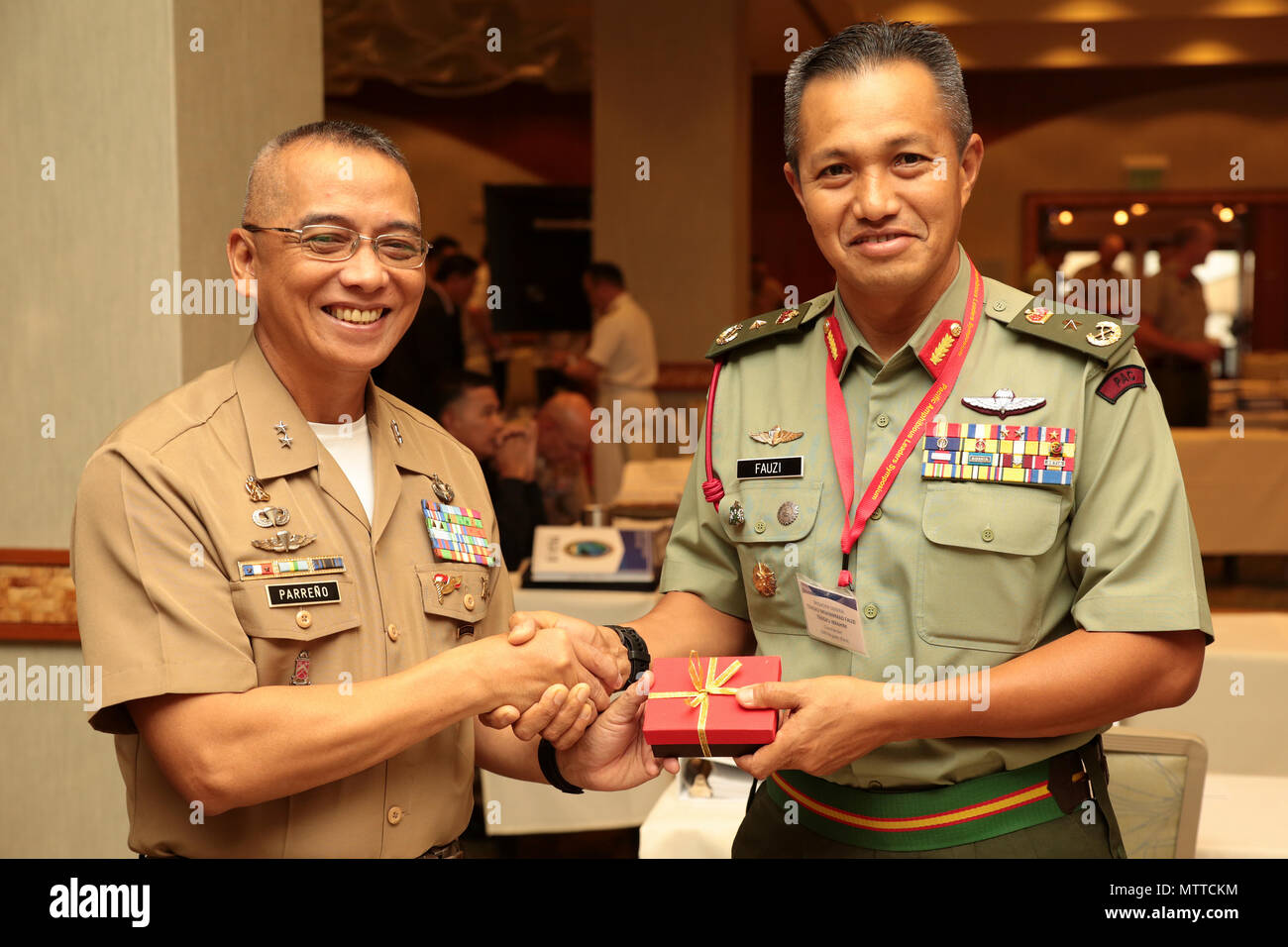 Philippine Marine Corps Maj. Gen. Alvin Parreño, left, commandant of ...