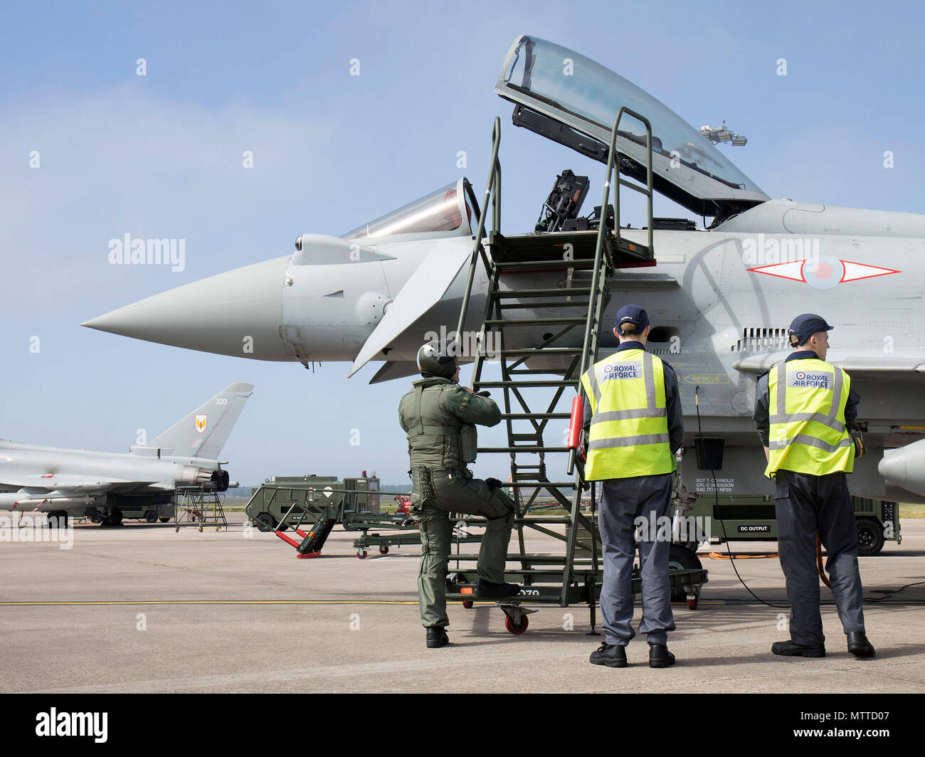 A Royal Air Force Eurofighter Typhoon pilot assigned to the RAF 1 ...