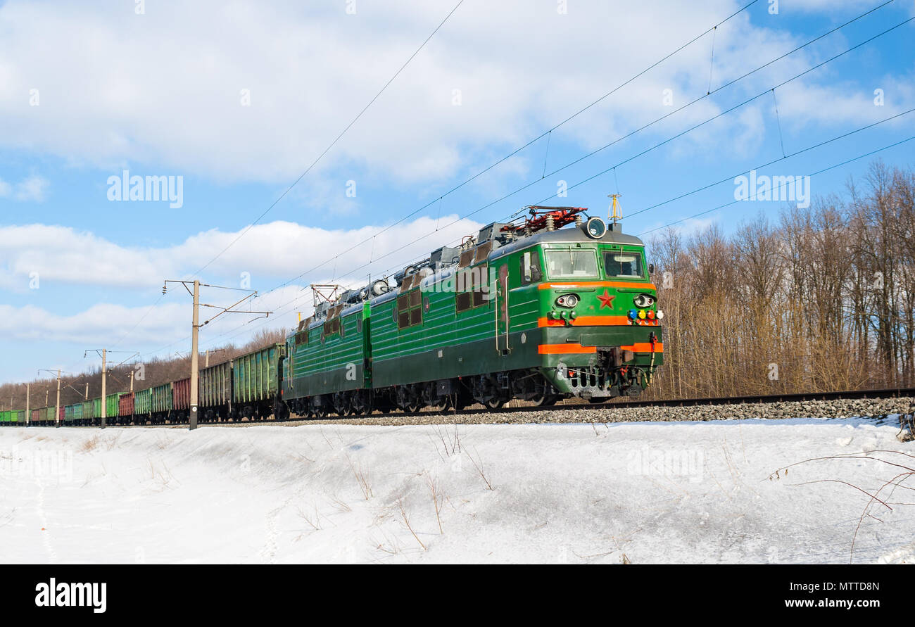 Freight train hauled by electric locomotive. Ukrainian railways Stock ...