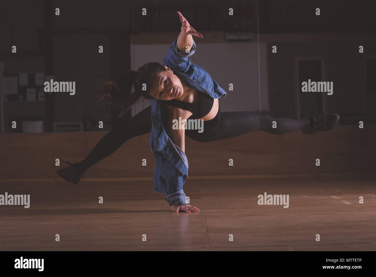 Female dancer dancing in dance studio Stock Photo - Alamy