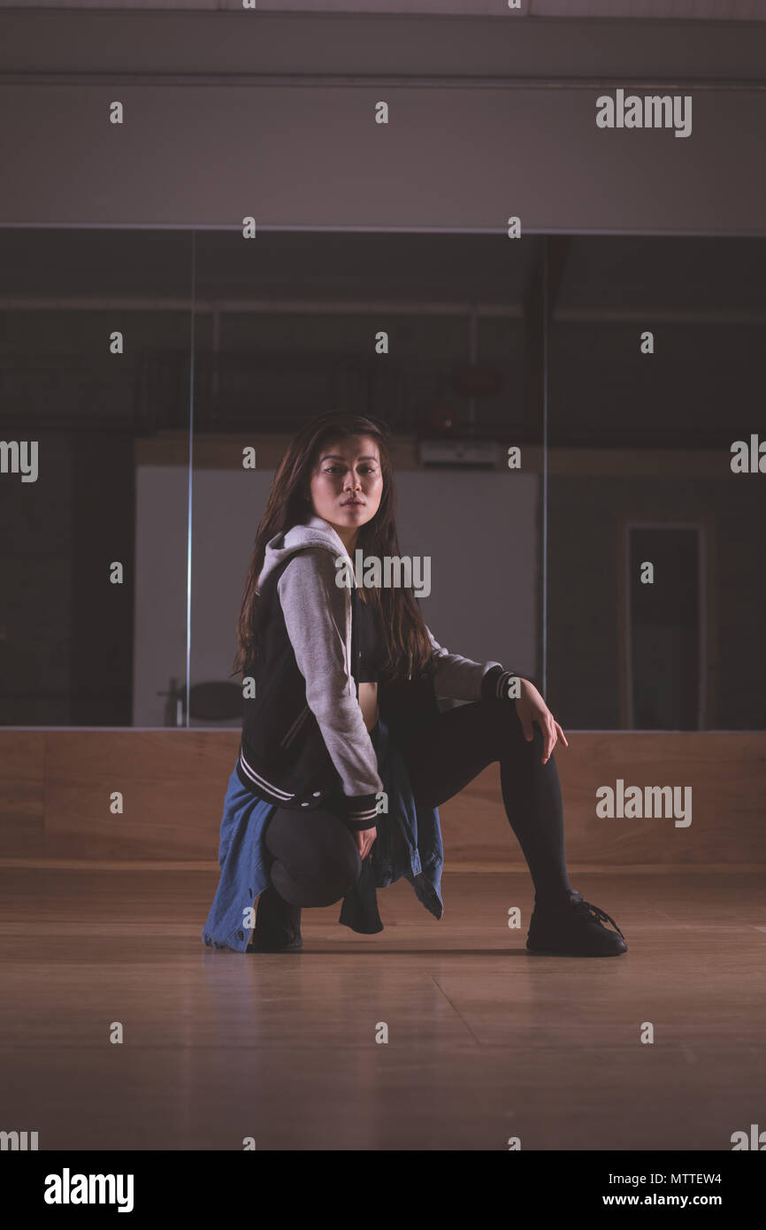 Crouching dance hi-res stock photography and images - Alamy