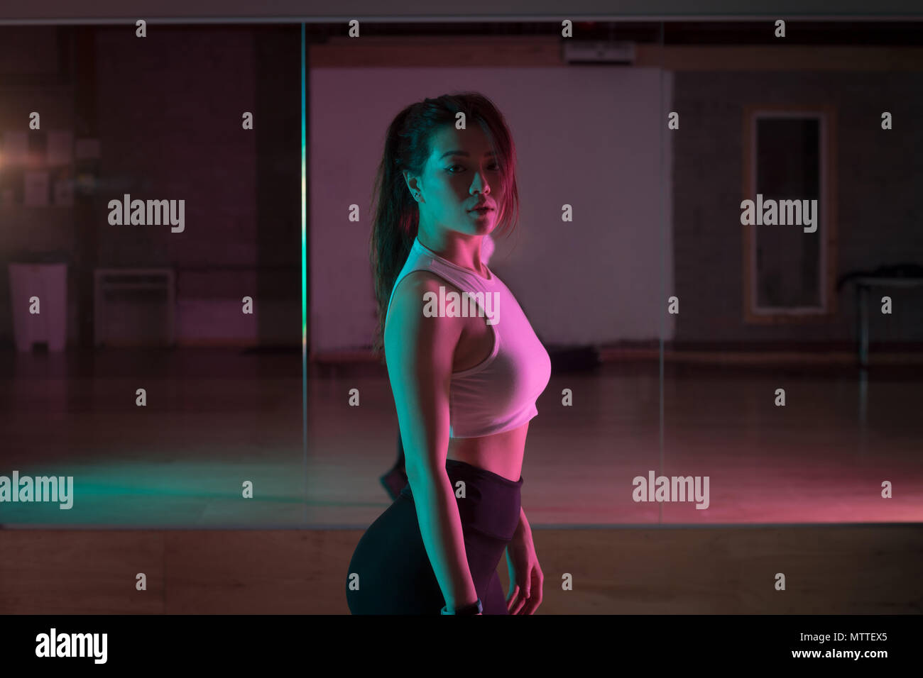 Female dancer standing in dance studio Stock Photo - Alamy