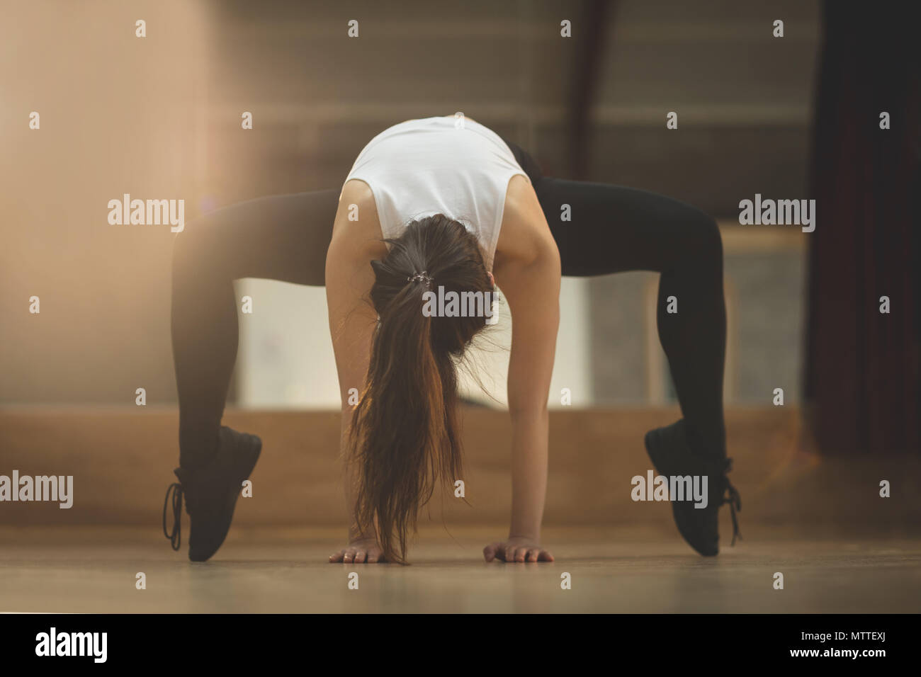 Female dancer dancing in dance studio Stock Photo - Alamy