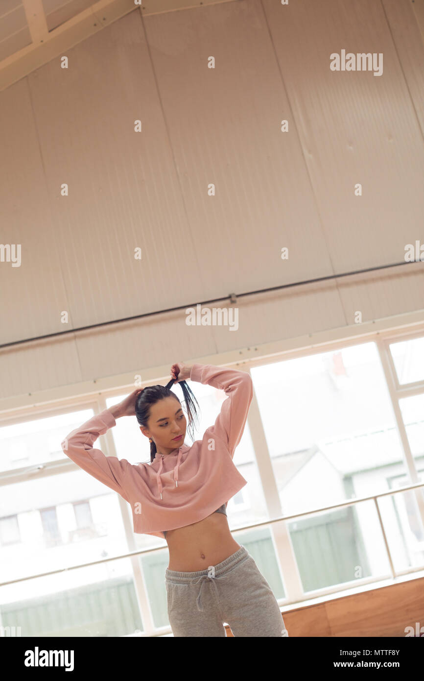 Female dancer standing in dance studio Stock Photo - Alamy