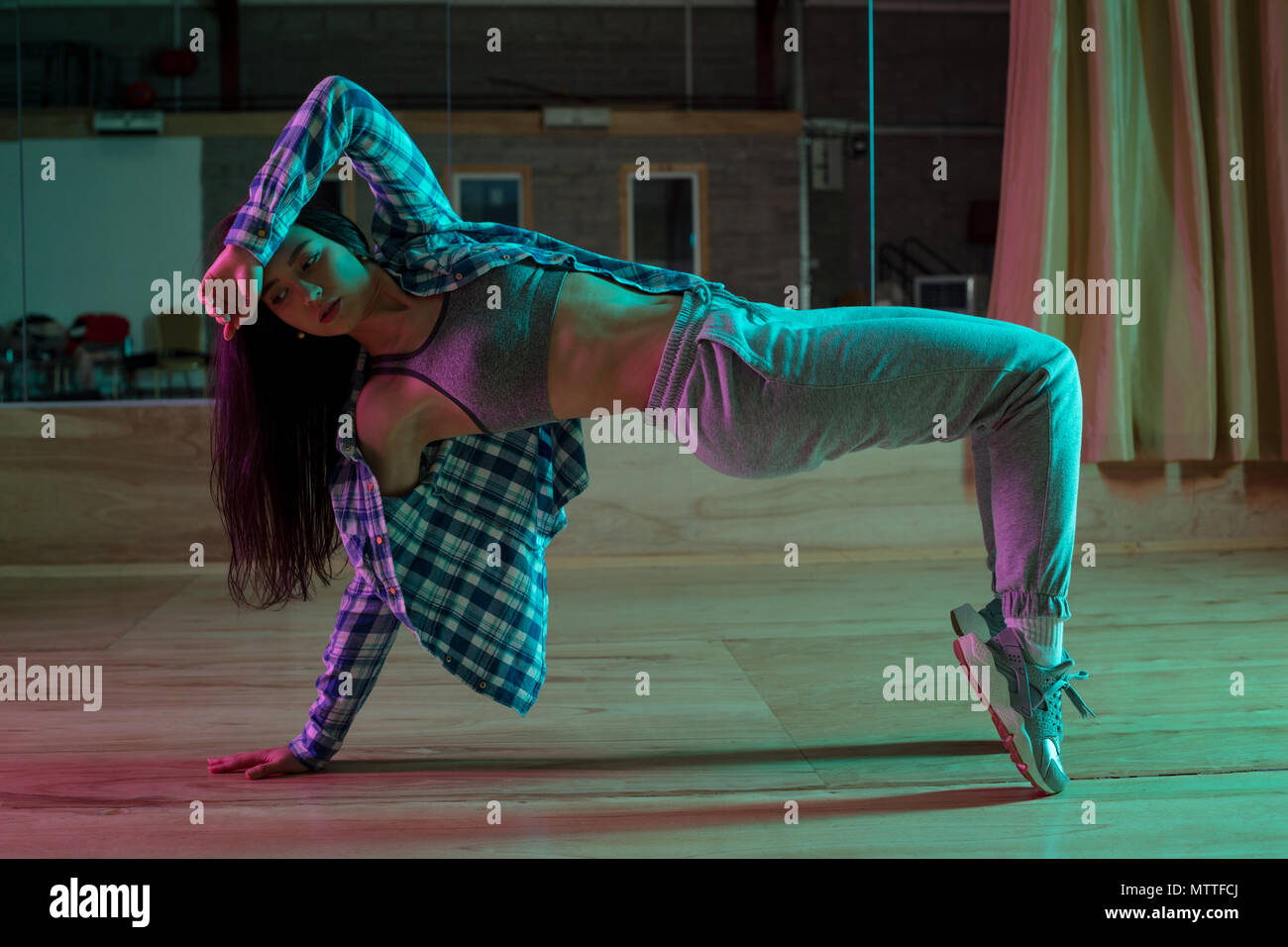 Female dancer dancing in dance studio Stock Photo - Alamy