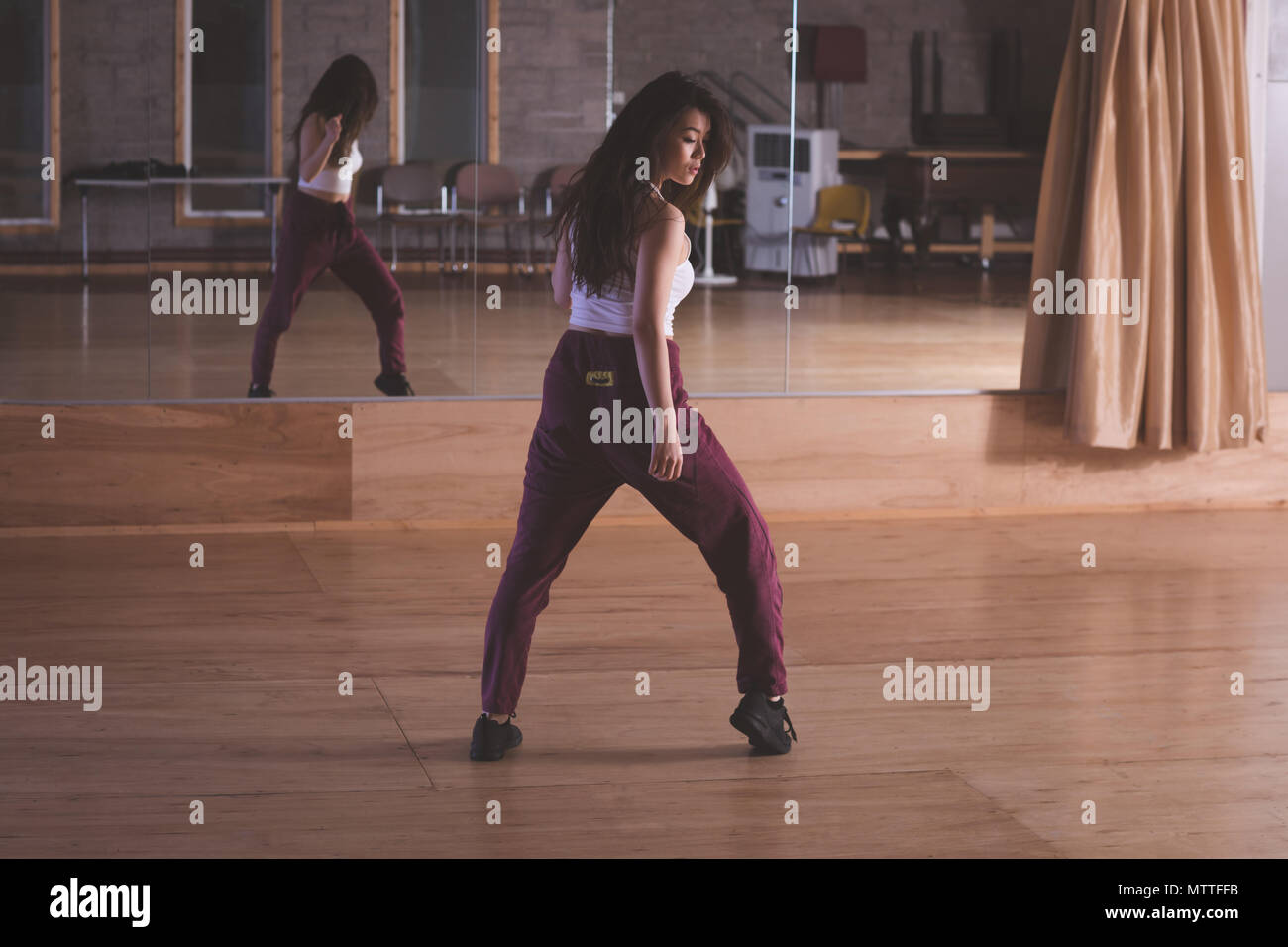 Pretty young female dancing in hi-res stock photography and images - Alamy