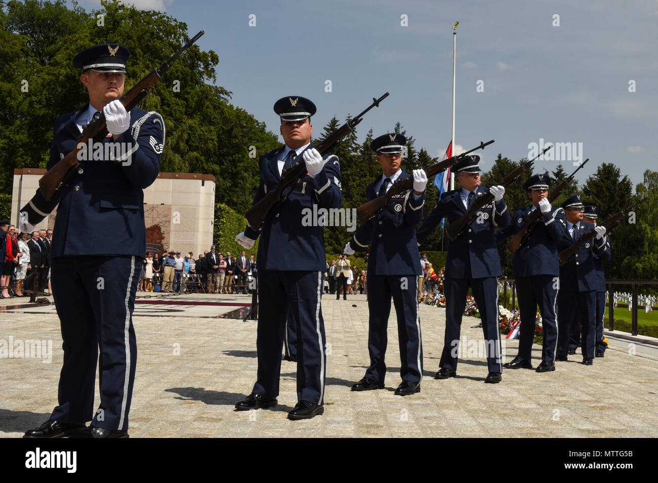 Members of the Spangdahlem Air Base Honor Guard perform a three volley ...