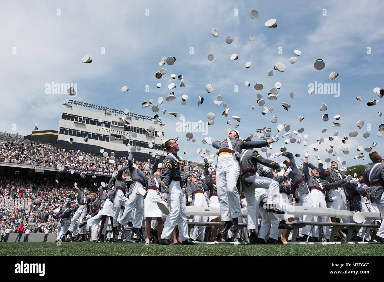 U.S. Military Academy cadets react as their graduation ceremony ...