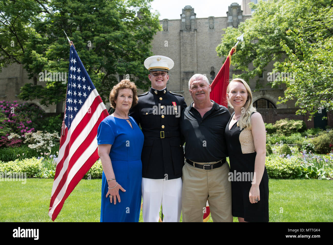 U.S. Marine Corps 2nd Lt. Ryan Ashley poses for a photo with family ...