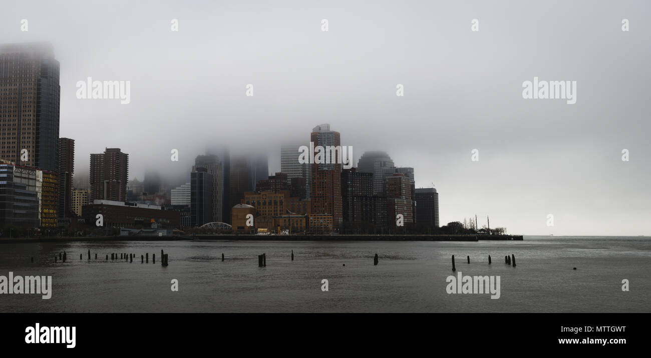 View of Lower Manhattan as it is being swallowed up by the fog. The fog ...