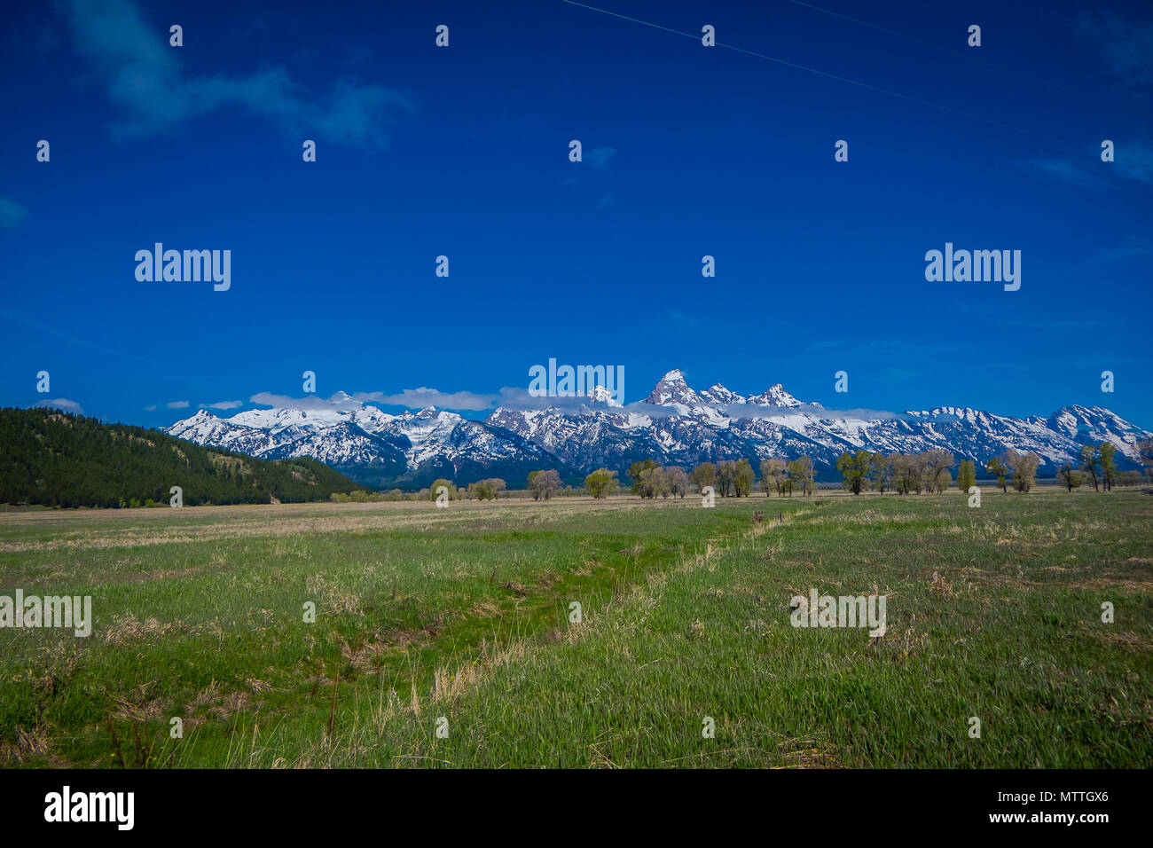 Beautiful landscape of the Grand Tetons range and peaks located inside ...