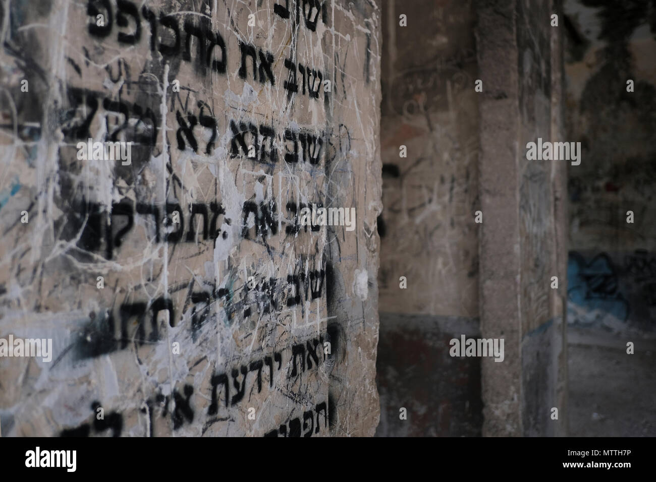 A romantic poem in Hebrew written in a wall inside a house which still ...