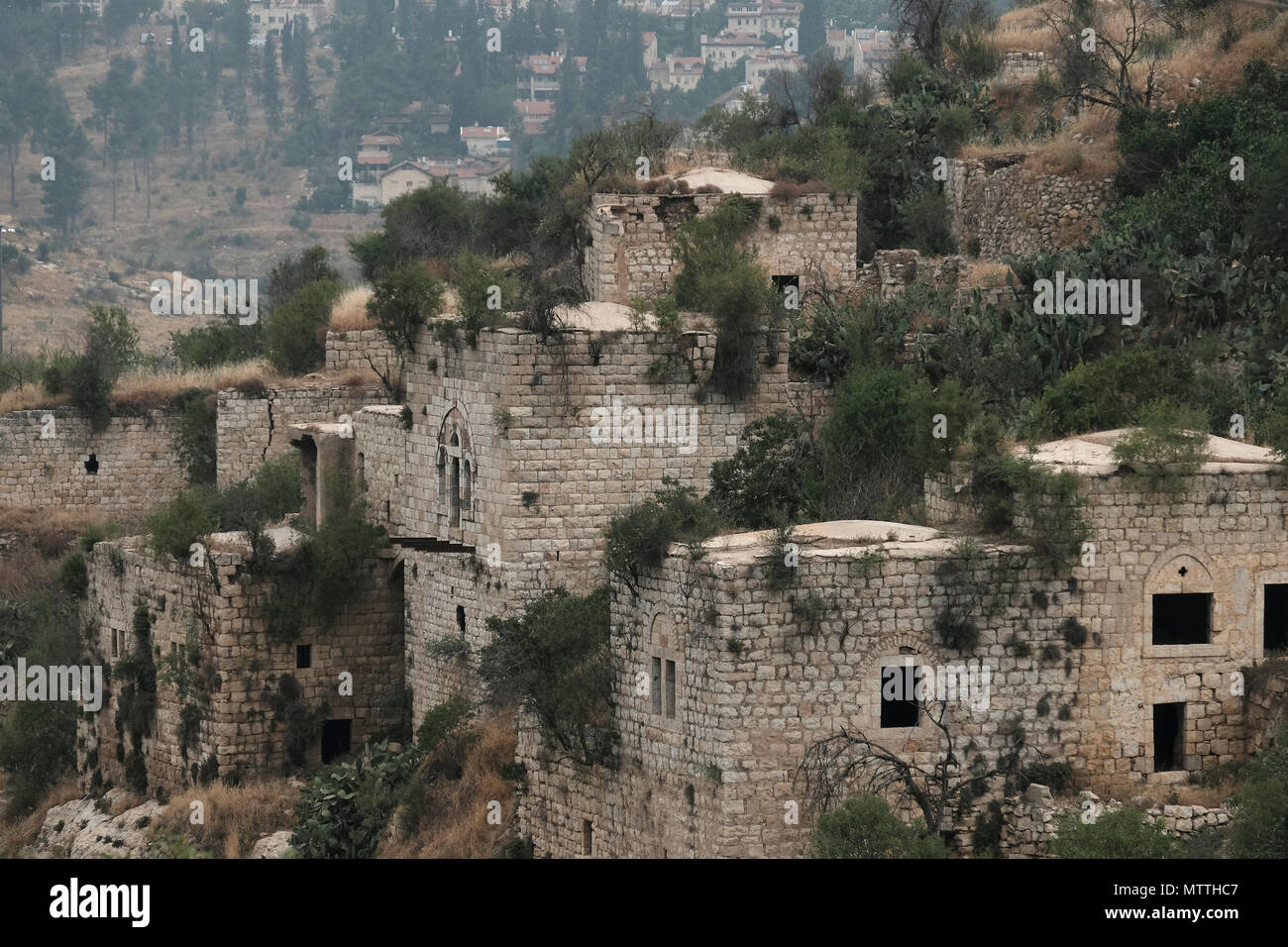 View of abandoned houses in the depopulated Palestinian village of ...