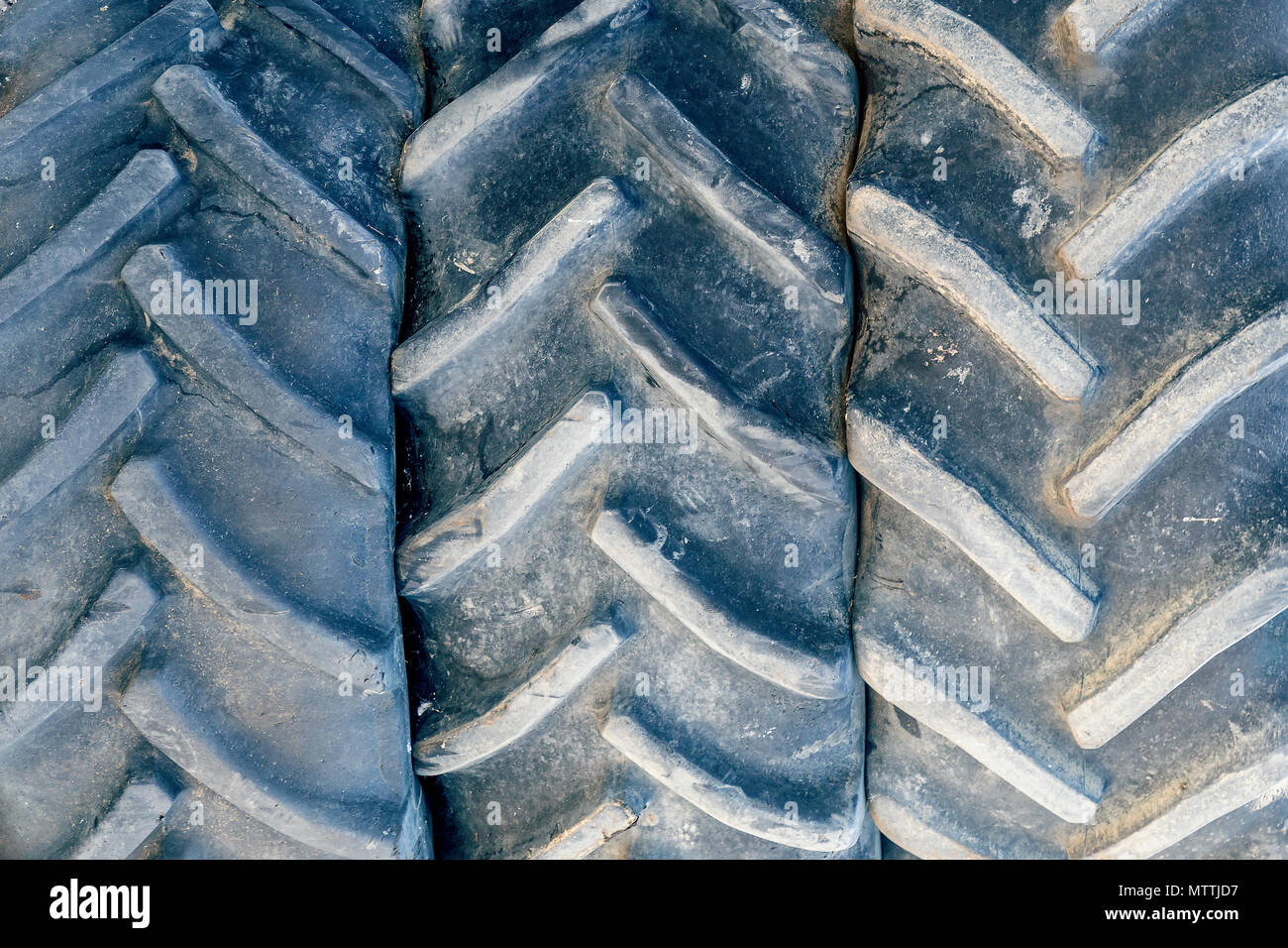 Used tractor tires background. Closeup of old tractor tyre Stock Photo ...