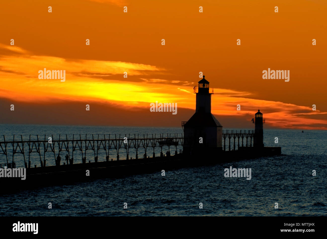 St. Joseph North Pier Lights in St. Joseph, Michigan at sunset Stock ...