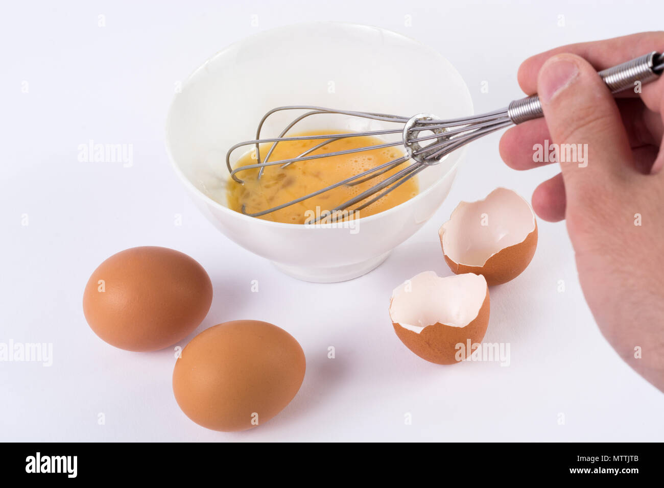 Whisking eggs hi-res stock photography and images - Alamy