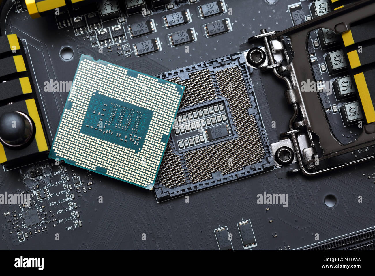 Modern central processor unit on motherboard Stock Photo - Alamy