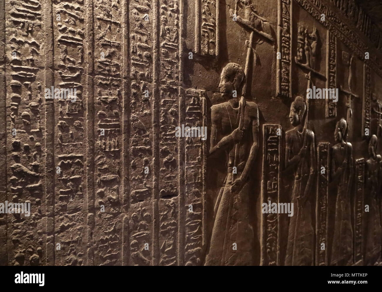 Hieroglyphic drawings and paintings on the wall of the corridor of the ...