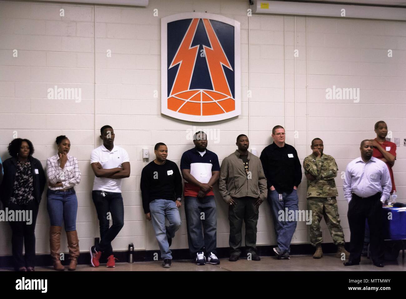 Full-time staff members of the 335th Signal Command Theater await the ...