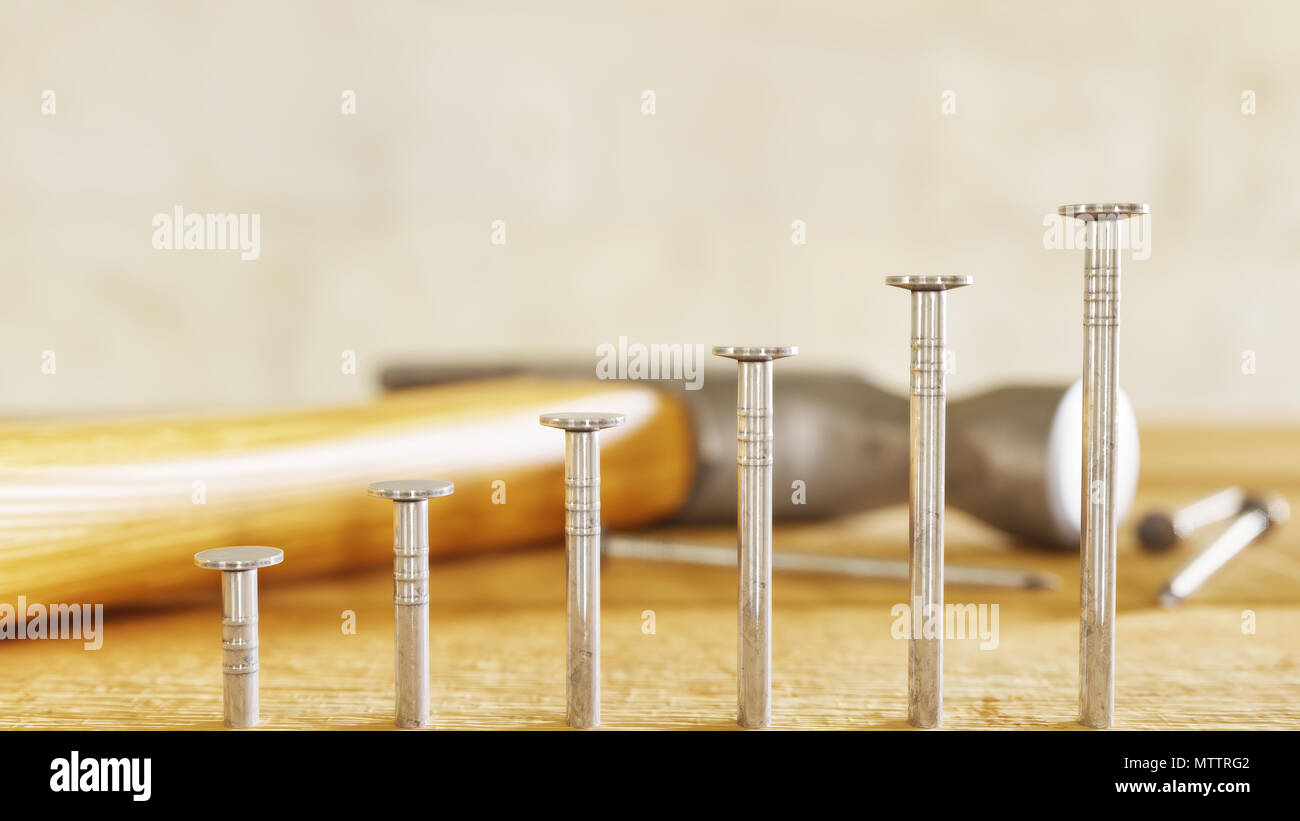 Graph layout carpentry nails in front of claw hammer and wood ...