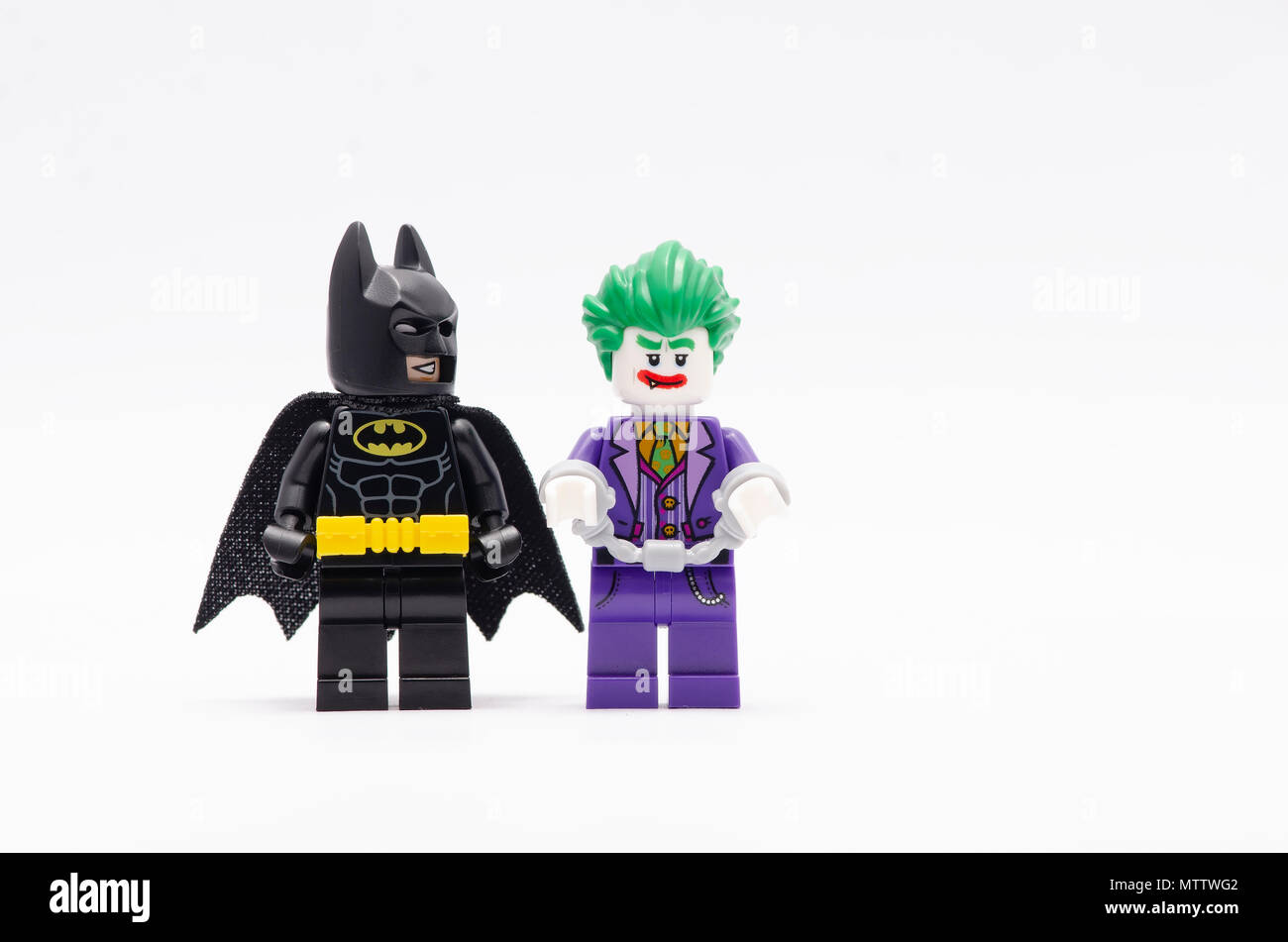 mini figure of batman and joker with handcuff. Lego minifigures are ...