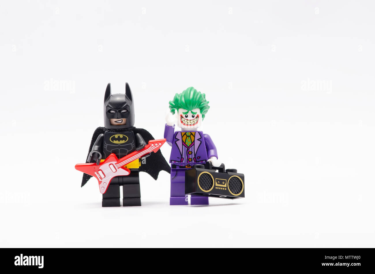 mini figure of batman holding a guitar with joker holding a radio. Lego ...