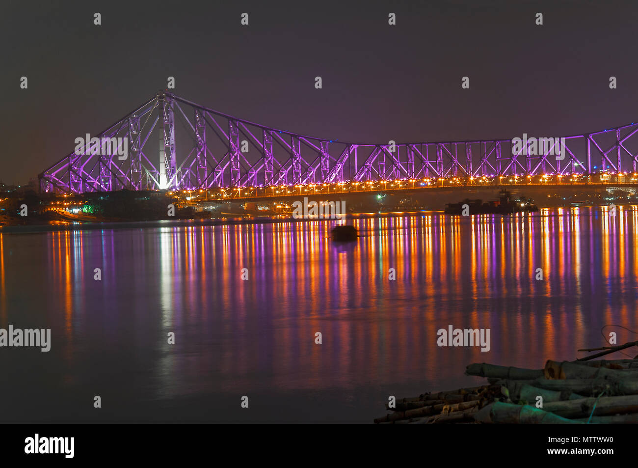 Howrah Bridge at night in purple light Stock Photo - Alamy