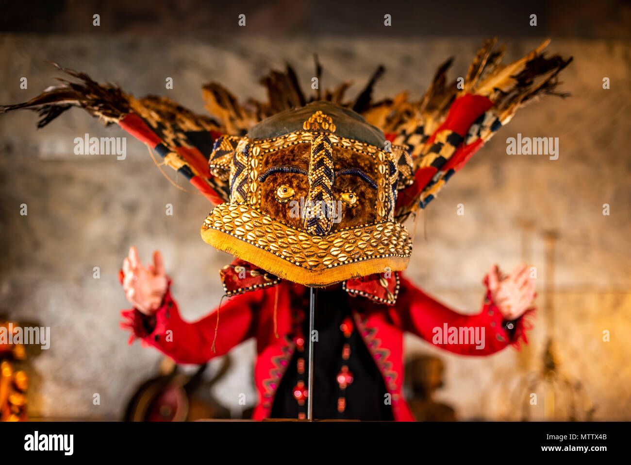 An example of tribal art, including this feathered helmet mask, "Mwaash ...
