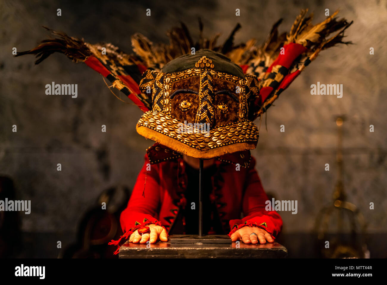 An example of tribal art, including this feathered helmet mask, "Mwaash ...