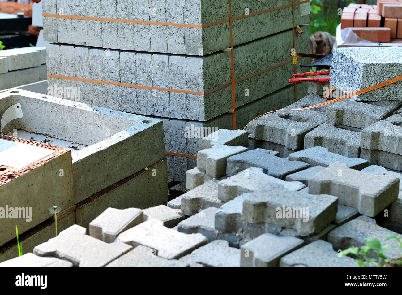 cement construction elements in stacks lying at construction site Stock ...