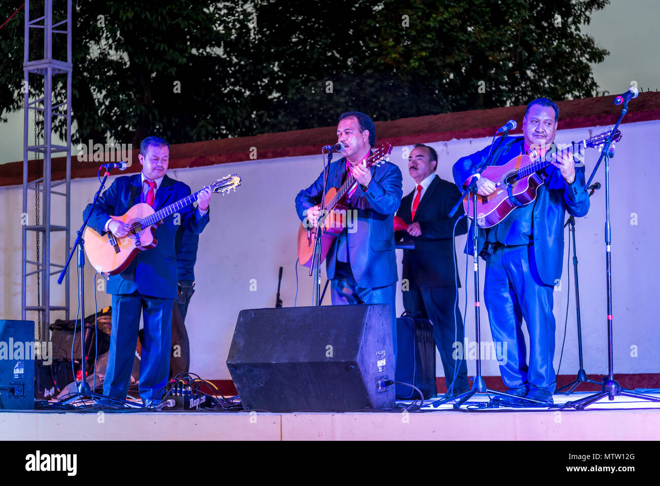 Traditional band playing music on a public stage, San Cristobal de las ...