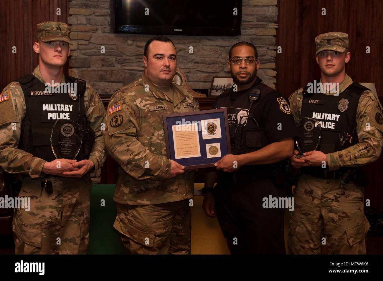 Police officers assigned to the 733rd Security Forces Squadron traffic ...