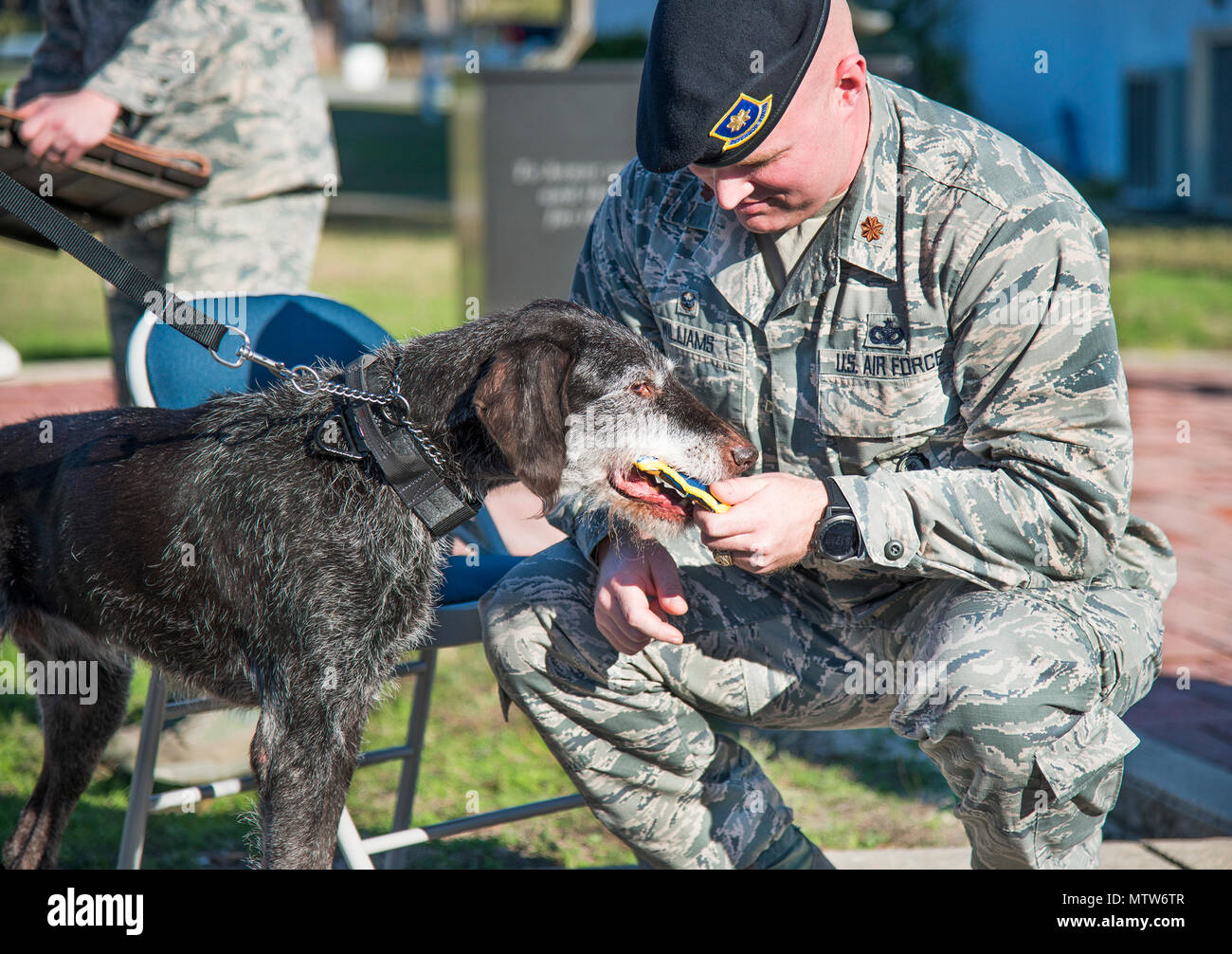 Maj. Jason Williams, 96th Security Forces Squadron commander, bends ...