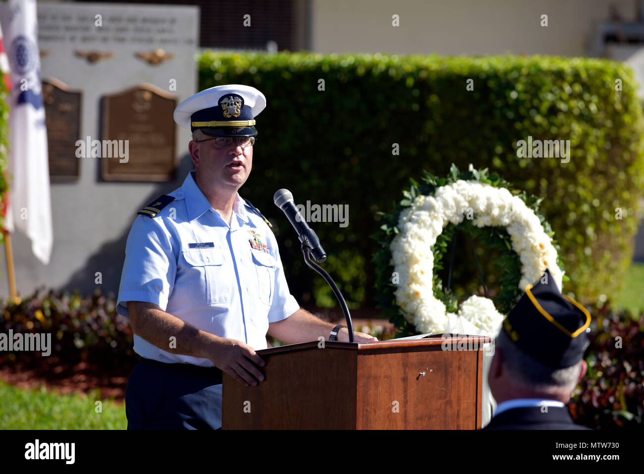 Navy Lt. Larry J. Brant, chaplain, gives the key note speech at a Coast ...